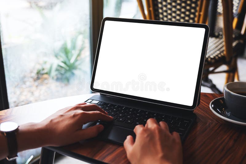A Woman Typing on Tablet Keyboard with Blank White Desktop Screen As a ...