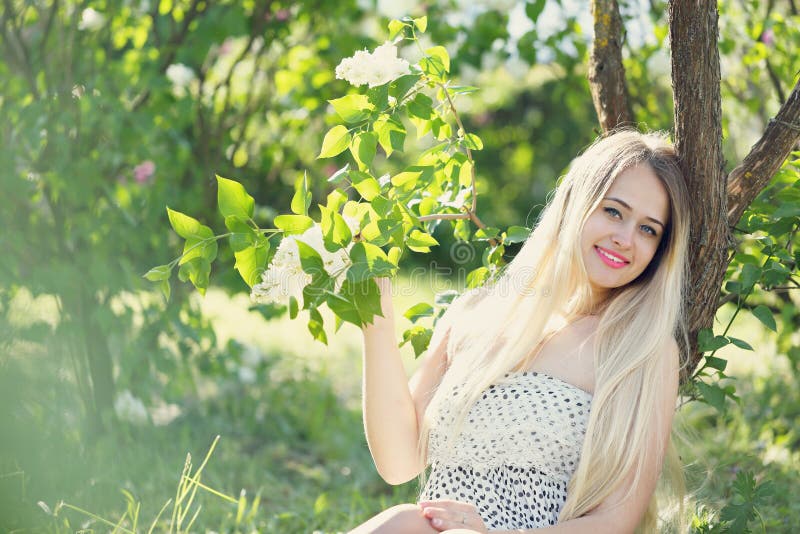 Woman under a bush stock image. Image of beauty, health - 87436155