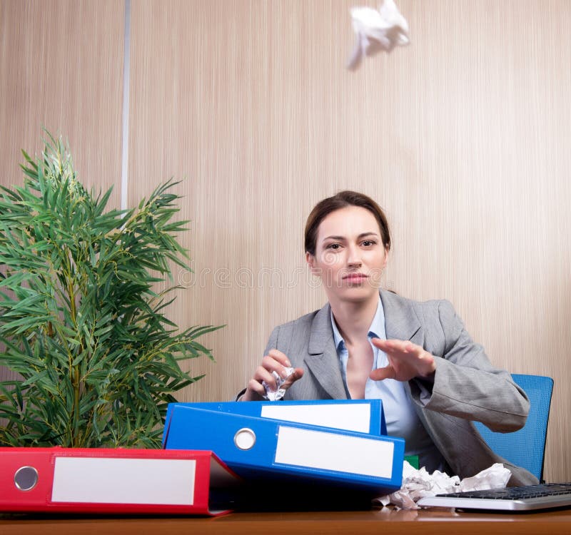 Woman Under Stress Tossing Papers in the Office Stock Photo - Image of ...