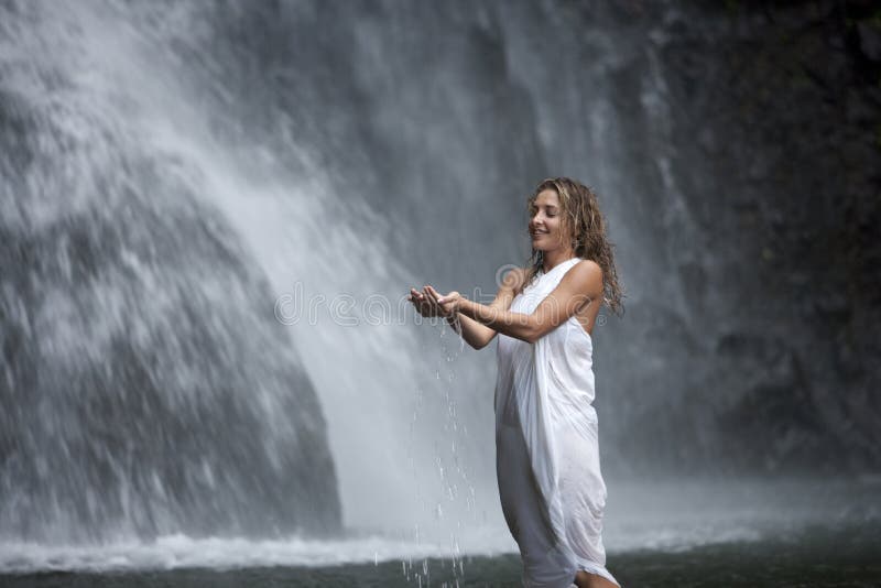 Woman Under Waterfall stock photo. Image of enjoyment - 25327168
