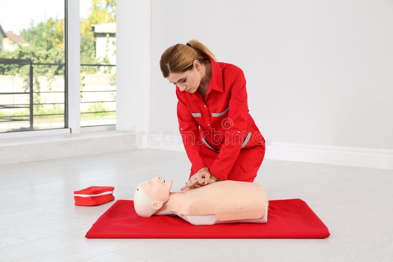 Woman in Uniform Practicing First Aid Stock Photo - Image of learn ...