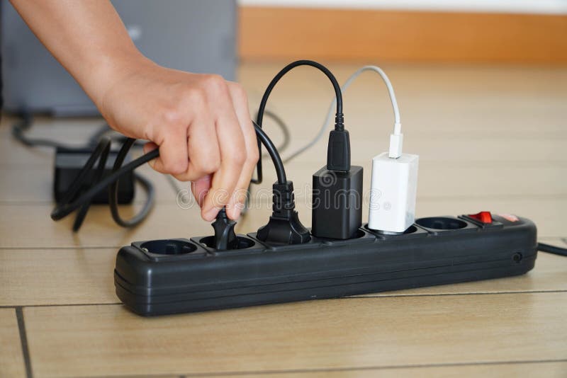 Woman Unplugged Plug To Save on Energy Stock Photo - Image of cables ...