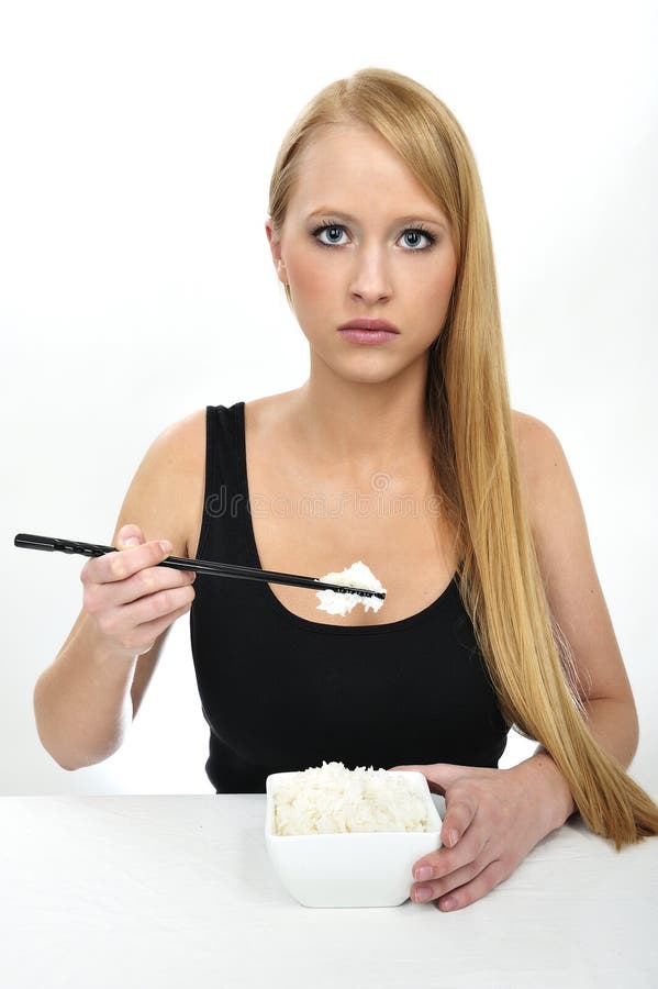 A Woman Use Chopsticks Eating Rice Stock Image - Image of food ...