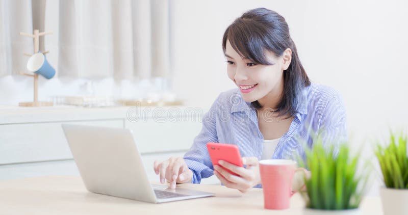 Woman Use Computer and Phone Stock Image - Image of phone, connection ...