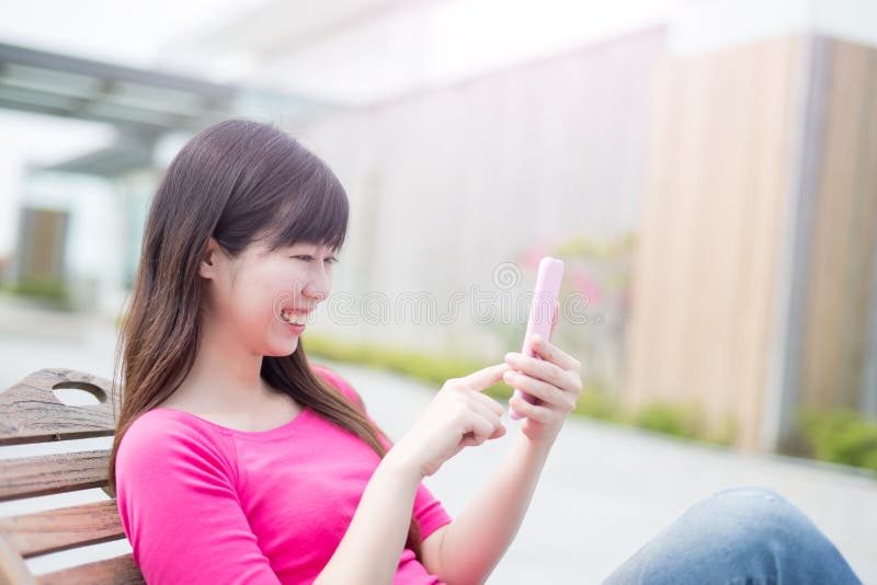 Woman use phone stock image. Image of green, female, smartphone - 91329741