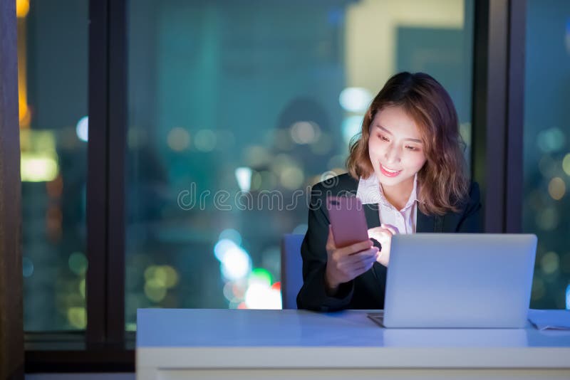 Woman Use Phone and Notebook Stock Photo - Image of human, evening ...