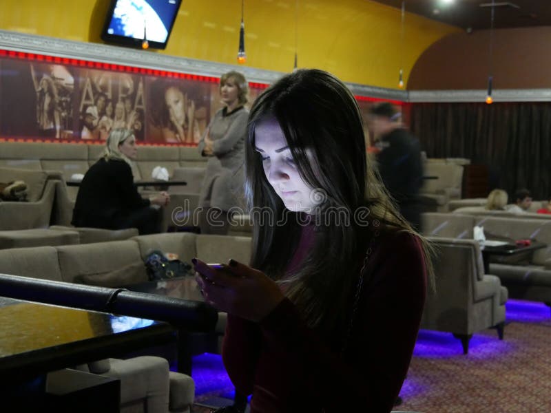 Woman Use Smartphone in Club Editorial Photography - Image of brunette ...