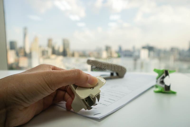 Woman Use Staple Removal the Paper Sheet Stock Photo - Image of left ...