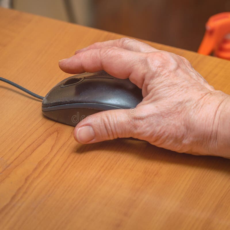 A Woman Uses a Computer Mouse Stock Photo - Image of connection ...