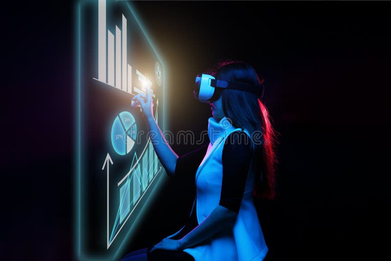 Woman Uses a Virtual Reality Headset To Work with Data in the Form of ...