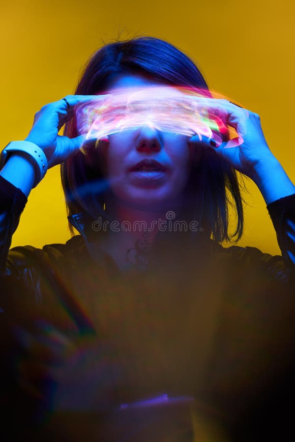 Woman is Using Augmented Reality Headset. Concept of Virtual, Augmented ... Woman is Using Augmented Reality Headset. Concept of Virtual, Augmented ...