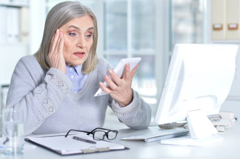 Woman using calculator stock image. Image of calculate - 86111247