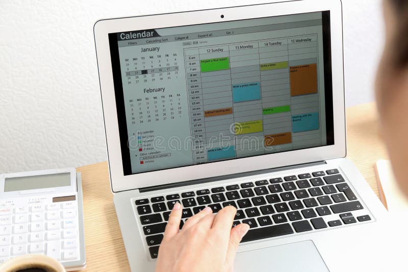 Woman Using Calendar App on Laptop in Office Stock Image - Image of ...