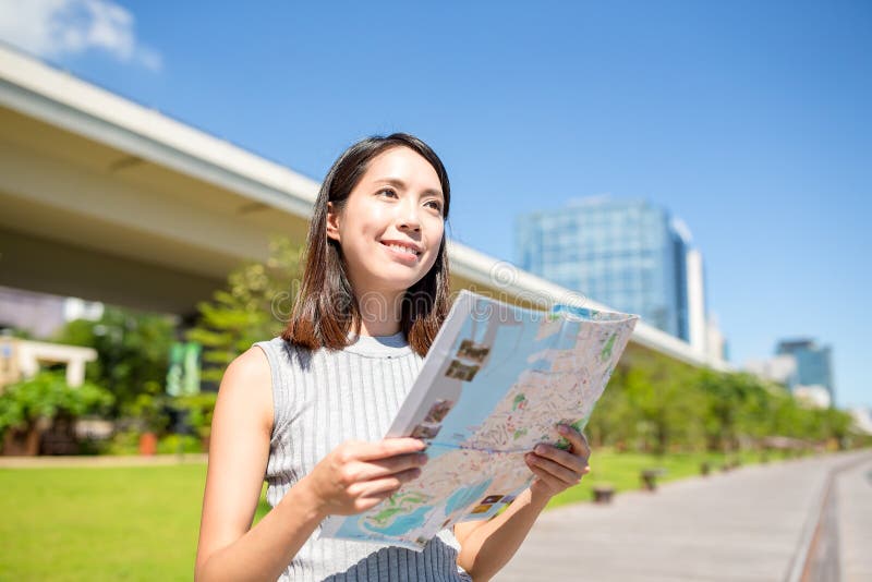 Woman using city map stock image. Image of journey, korean - 74238357