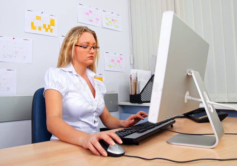 Woman using computer stock photo. Image of glasses, beauty - 7594820