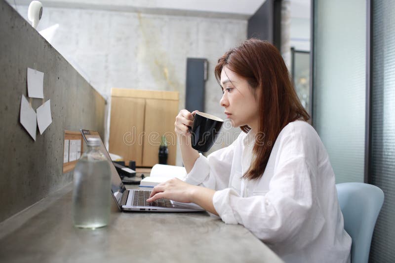 Woman Using the Computer on the Desk Stock Image - Image of home, asia ...
