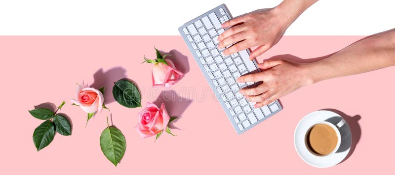 Woman Using Computer Keyboard with Pink Roses Stock Photo - Image of ...
