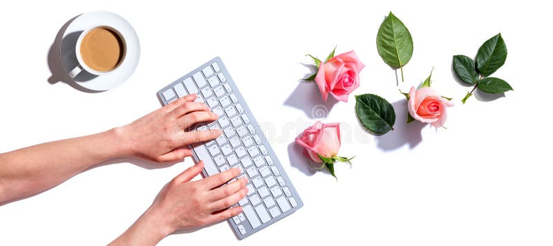 Woman Using Computer Keyboard with Pink Roses Stock Photo - Image of ...