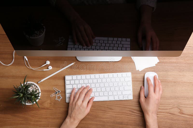Woman Using Computer Mouse and Keyboard at Office Table Stock Photo ...