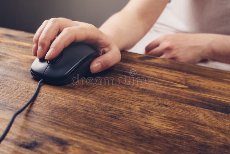 Woman using computer mouse stock image. Image of female - 73260753
