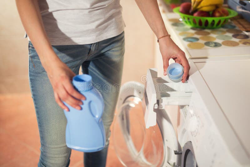Woman Using Conditioner for Washing Machine Stock Photo - Image of ...