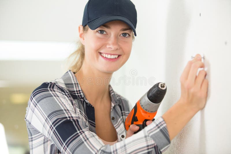 Woman Using Cordless Screwdriver Stock Photo - Image of woman ...