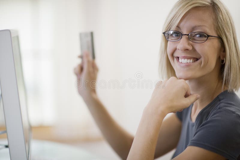 Woman Using Credit Card and Computer Stock Photo - Image of horizontal ...
