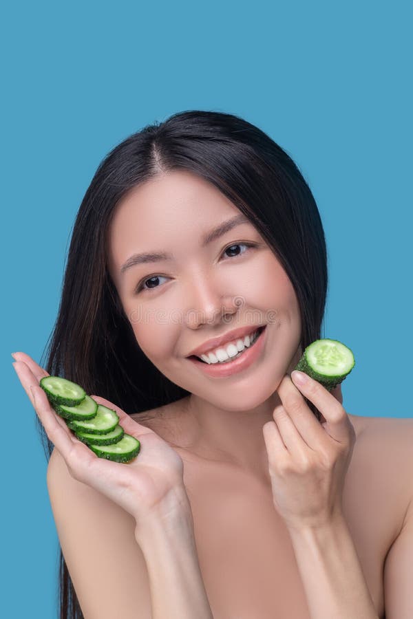 Woman Using Cucumbers For Face Care Mask Stock Image Image Of