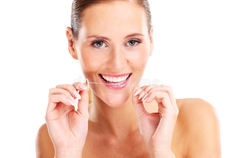 Woman using dental floss stock photo. Image of flossing - 65246048