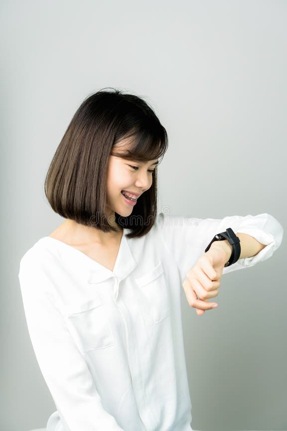 Woman Using a Digital Clock in the Display and Technology Advances in ...