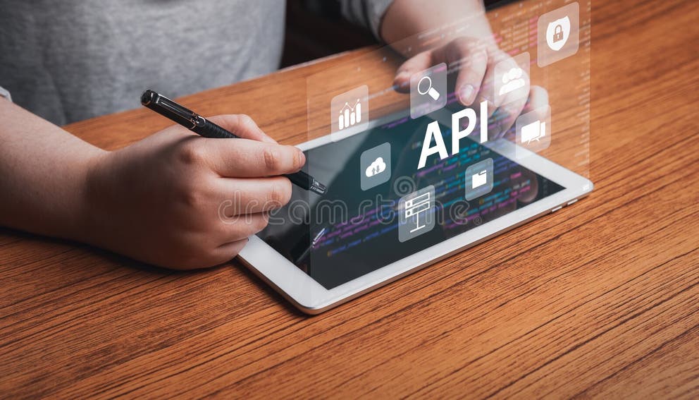 Woman Using Digital Tablet with API Application Programming Interface ...