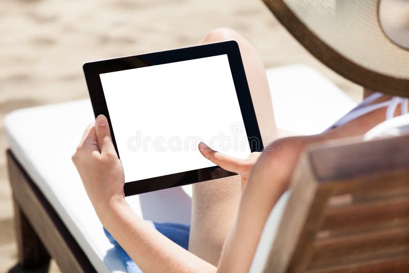 Woman Using Digital Tablet on Beach Chair Stock Image - Image of ...
