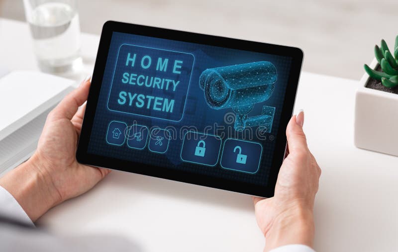 Woman Using Digital Tablet with Home Security Application Stock Image ...