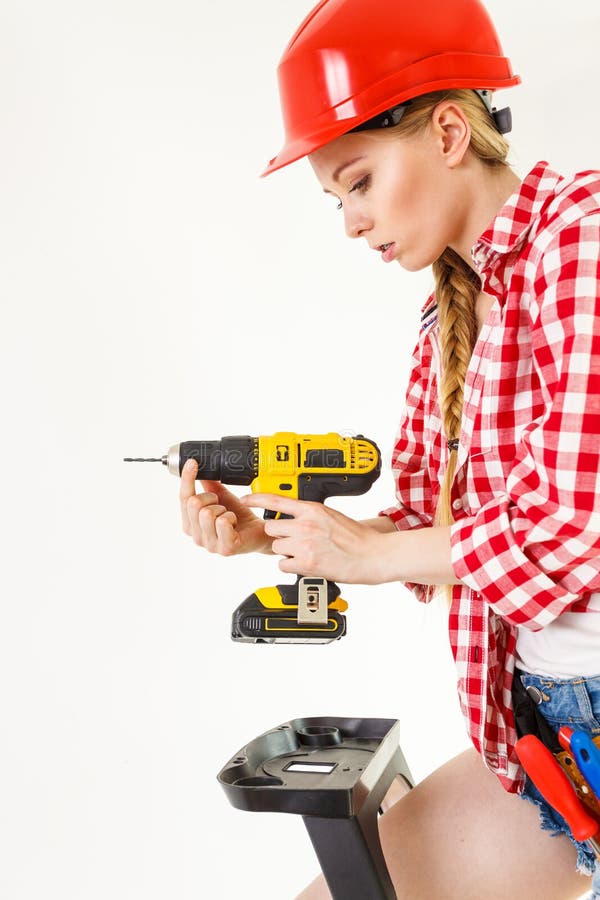 Woman Using Drill on Ladder Stock Photo - Image of adjusting, safety ...