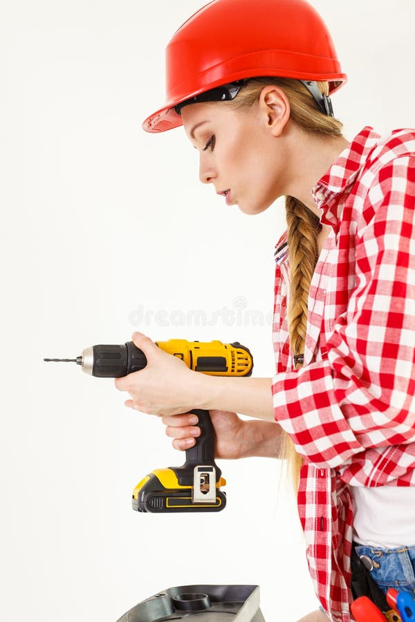 Woman Using Drill on Ladder Stock Image - Image of helmet, aiming ...