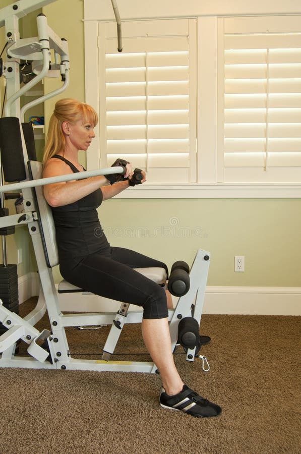 Woman using barbeque grill stock photo. Image of grill - 21189268