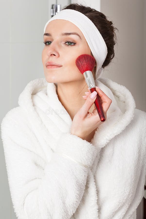 Woman using face powder stock photo. Image of freshness - 41139648