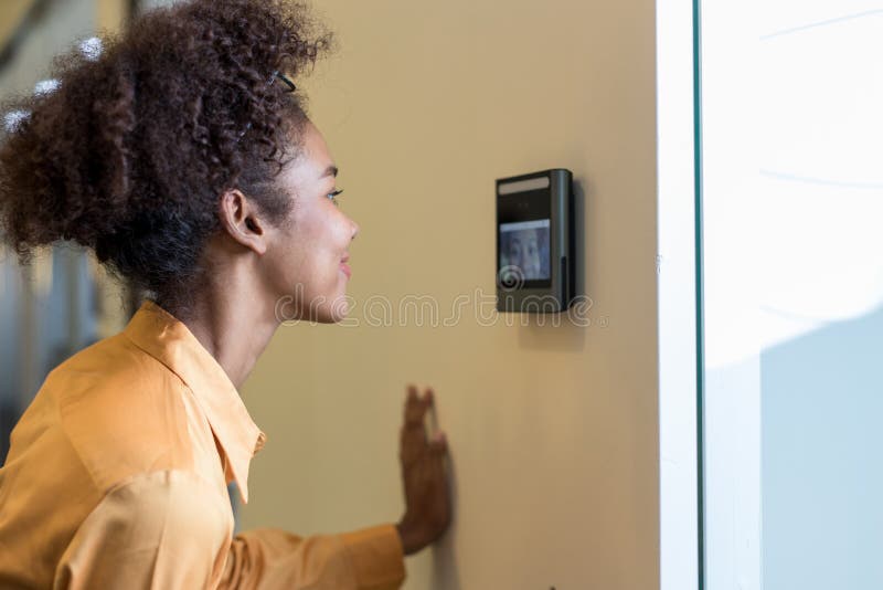 Woman Using Face Scanner To Unlock Door in Office Building. Access ... Woman Using Face Scanner To Unlock Door in Office Building. Access ...