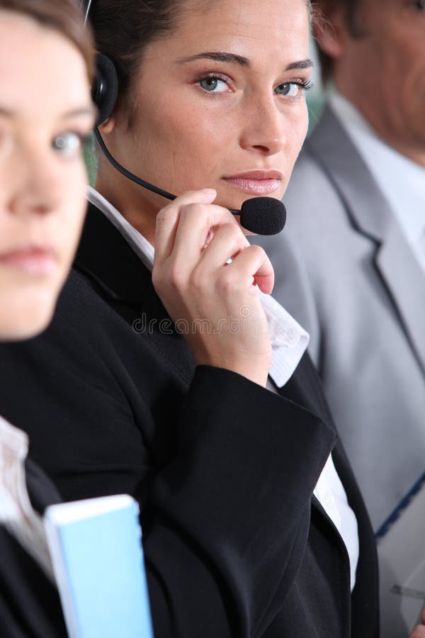 Woman using headset stock photo. Image of headphones - 28196056