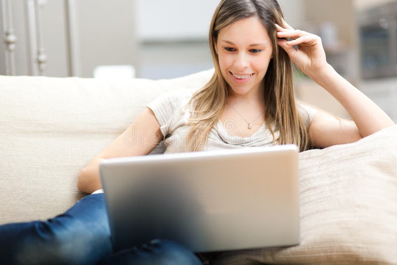 Woman Using Her Laptop on Her Couch Stock Image - Image of woman, couch ...