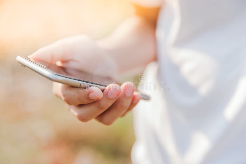 Woman Using Her Mobile Phone Stock Photo - Image of beautiful, female ...