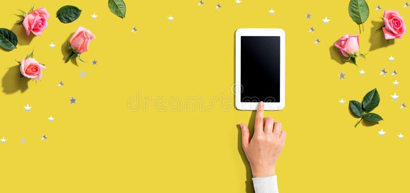 Woman Using Her Tablet Computer Pink Roses Stock Photos - Free ...