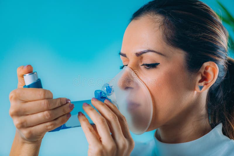 Woman Using Inhaler for Asthma Stock Photo - Image of patient, inhaler ...