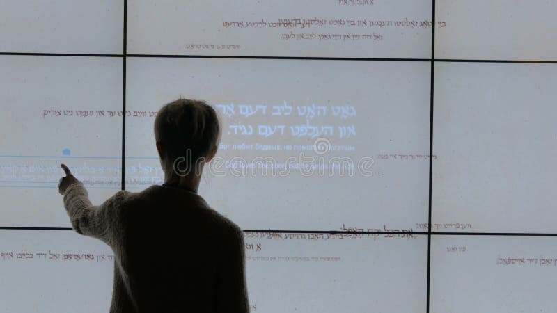Woman Using Interactive Touchscreen Display at Jewish History Museum ...
