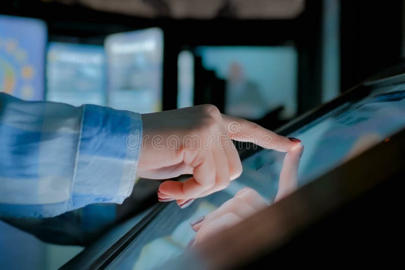 Woman Using Interactive Touchscreen Display at Modern History Museum ...