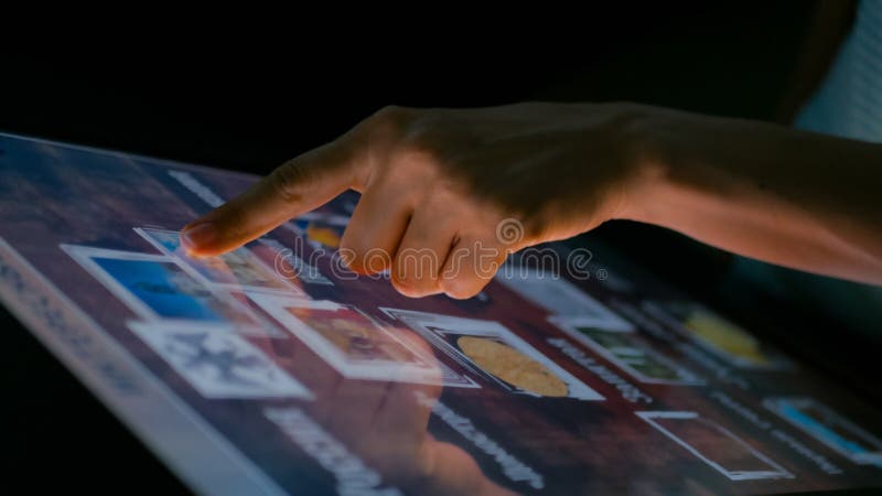 Close Up Of A Hand Touching To Screen Large Display While Consults ...