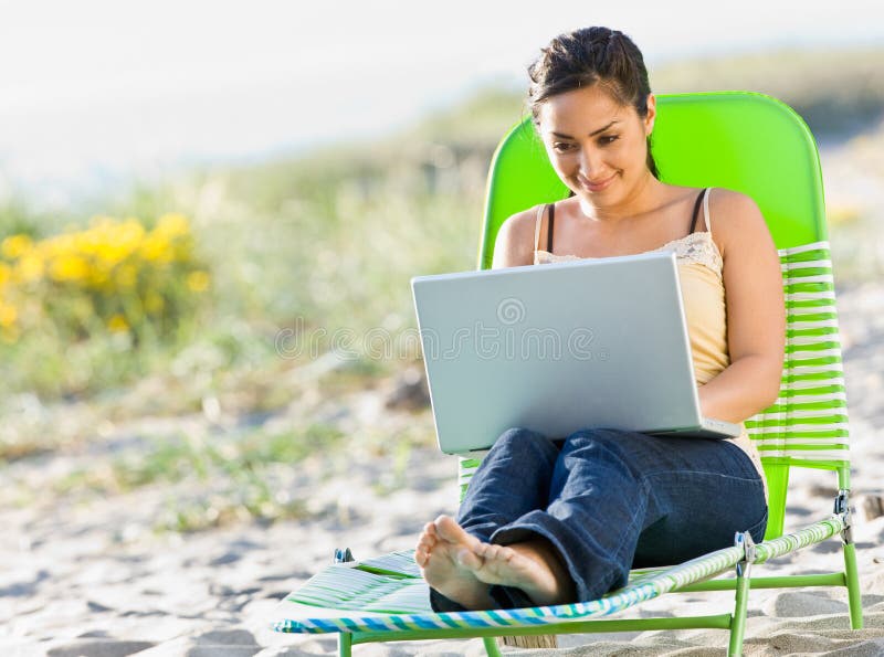 Woman Using Laptop at Beach Stock Image - Image of typist, nature: 7430687