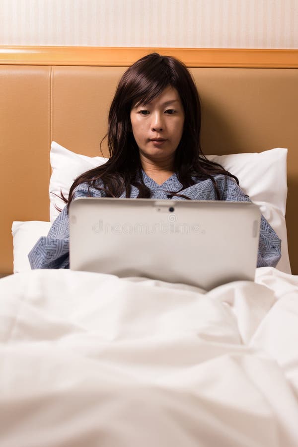 Woman Using Laptop on the Bed Stock Image - Image of laptop, internet ...