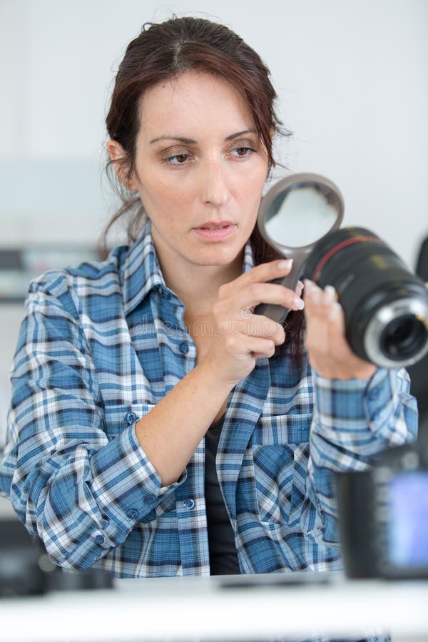 Woman Using Magnifier in Looking through Lens Stock Image - Image of ...