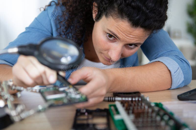 Woman Using Magnifying Glass Stock Photo - Image of repairing ...